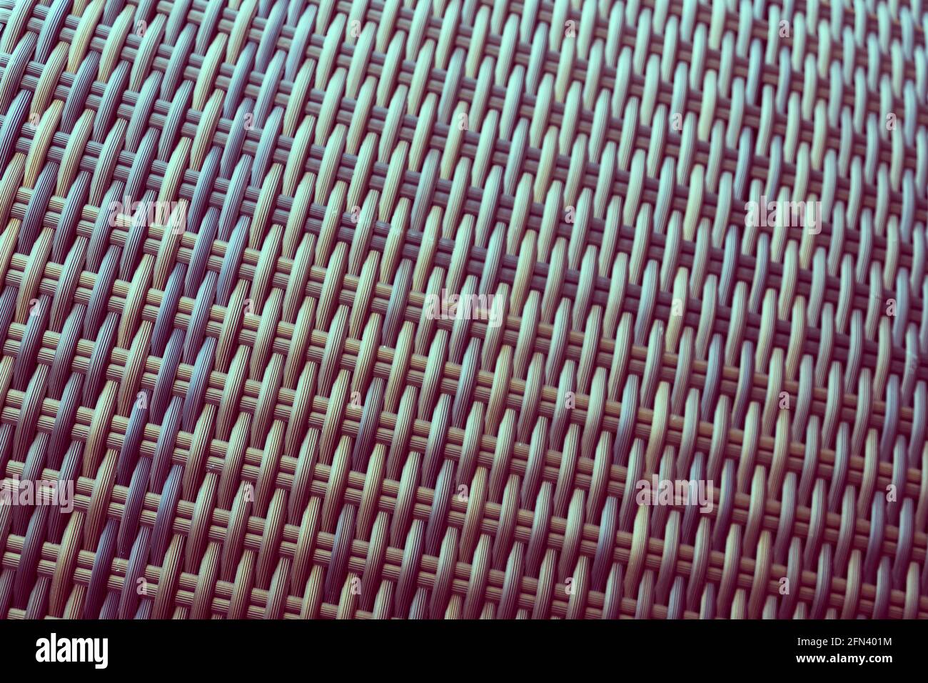 Synthetic rattan texture weaving background as used on outdoor garden ...