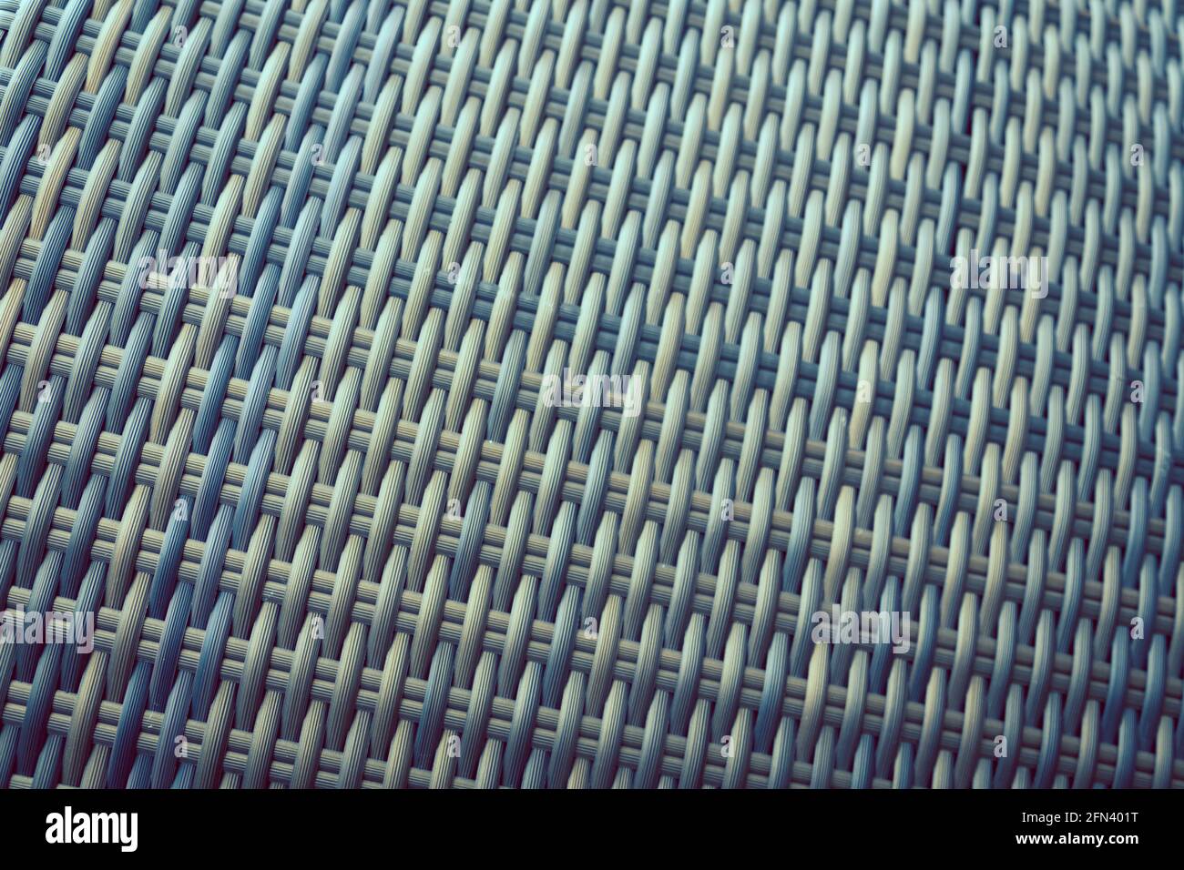 Synthetic rattan texture weaving background as used on outdoor garden ...