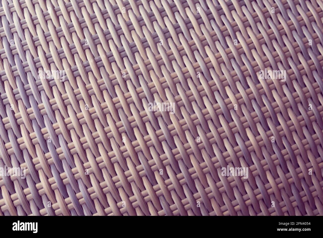 Synthetic rattan texture weaving background as used on outdoor garden ...