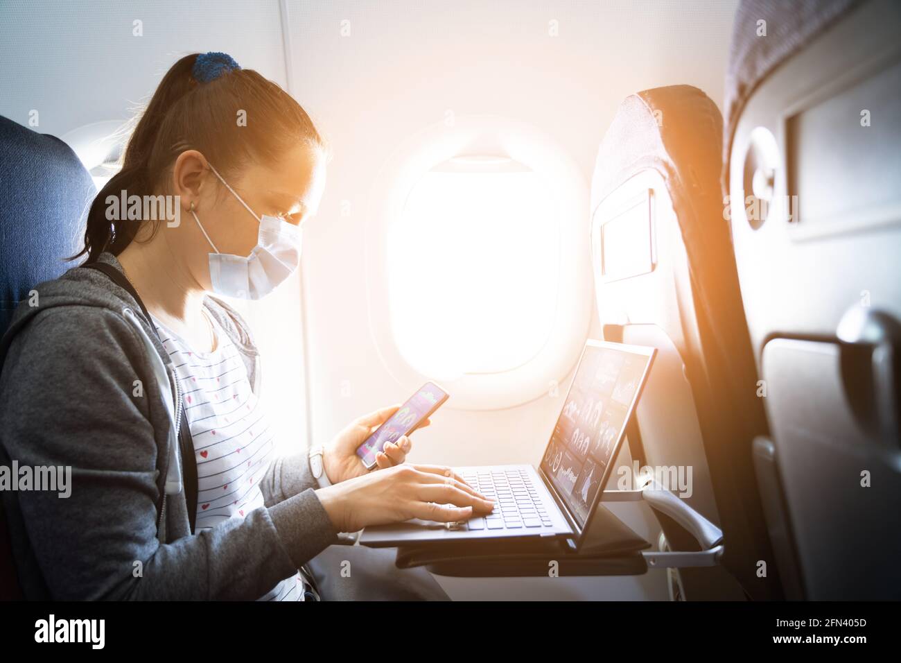 Laptop passenger seat plane hi-res stock photography and images - Alamy