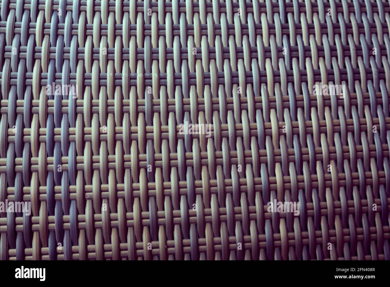 Synthetic rattan texture weaving background as used on outdoor garden ...