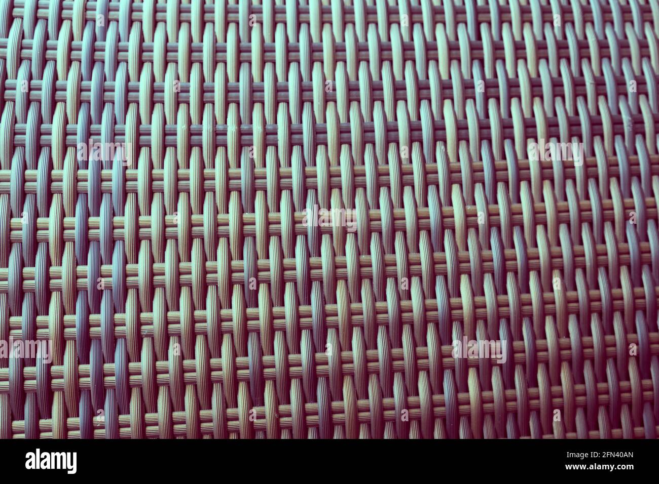 Synthetic rattan texture weaving background as used on outdoor garden ...