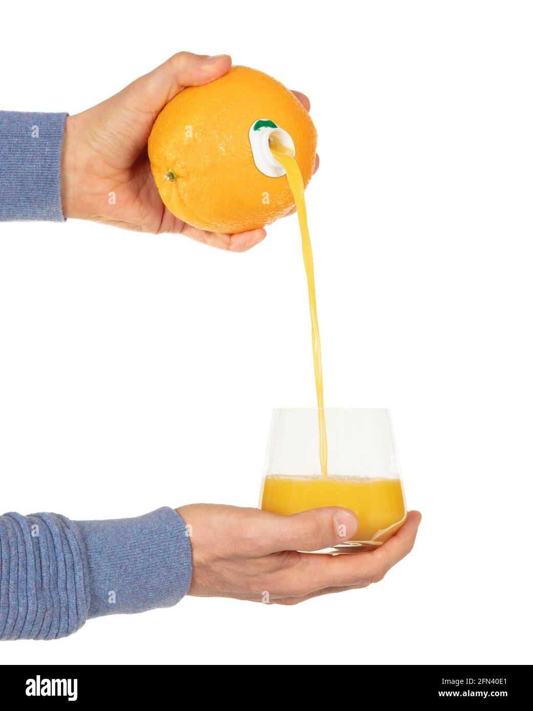 Orange juice pouring in glass, straight out of the orange Stock Photo ...