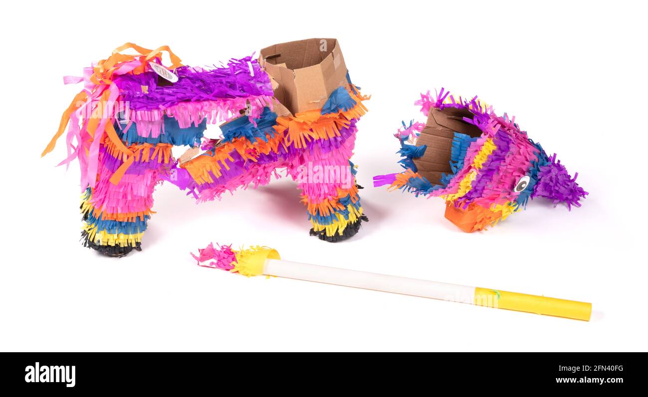 Broken colorful donkey pinata isolated on white background Stock Photo ...