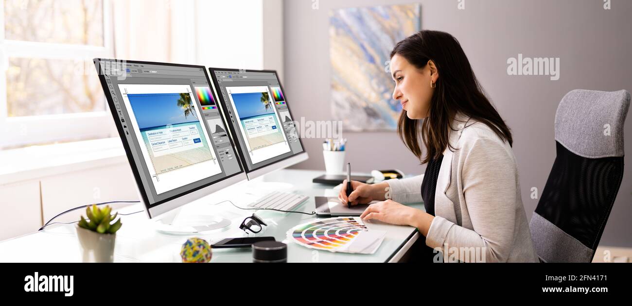 Graphic Web Designer Using Multiple Monitors Desktop Computer Stock ...