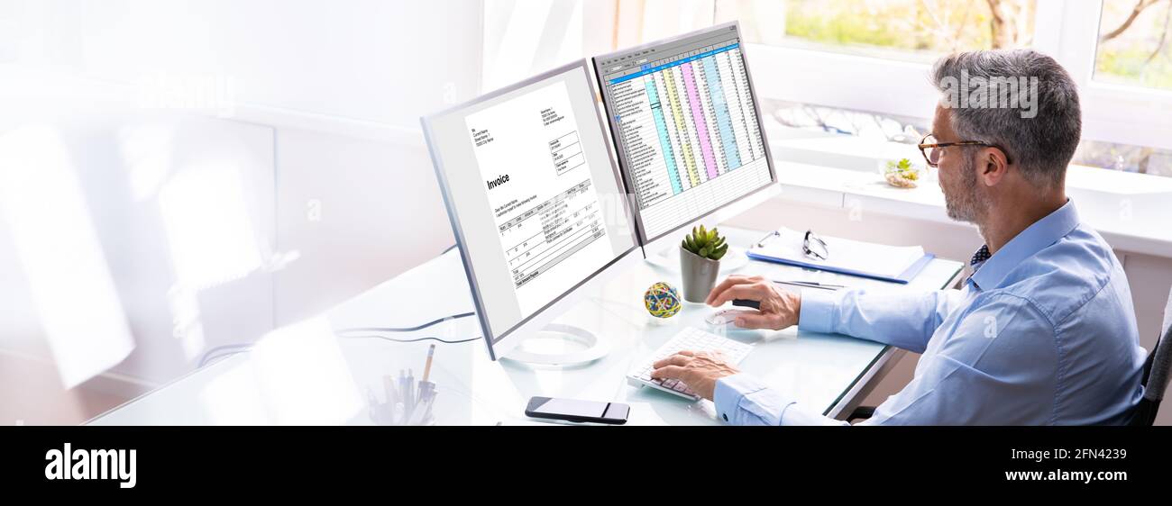 Electronic Medical Bill Manager In Office Using Codes Stock Photo - Alamy
