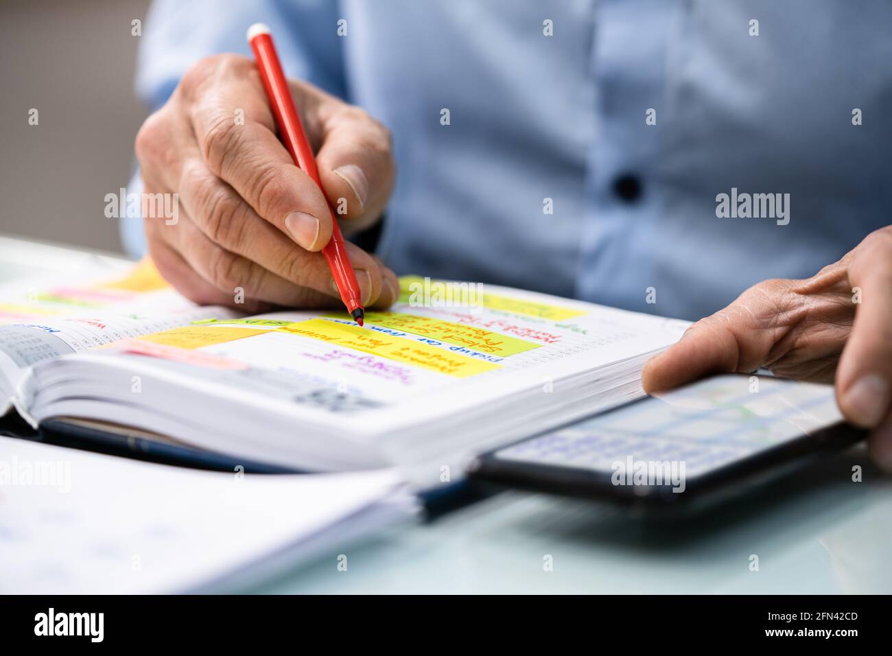 Calendar Schedule Plan In Paper And On Phone Stock Photo - Alamy
