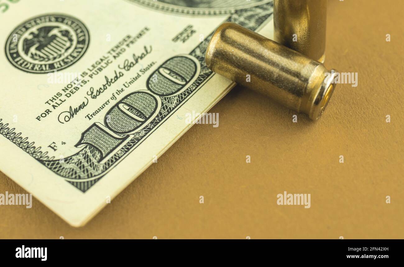 Dollar and bullet close-up, criminal money and mafia concept Stock ...