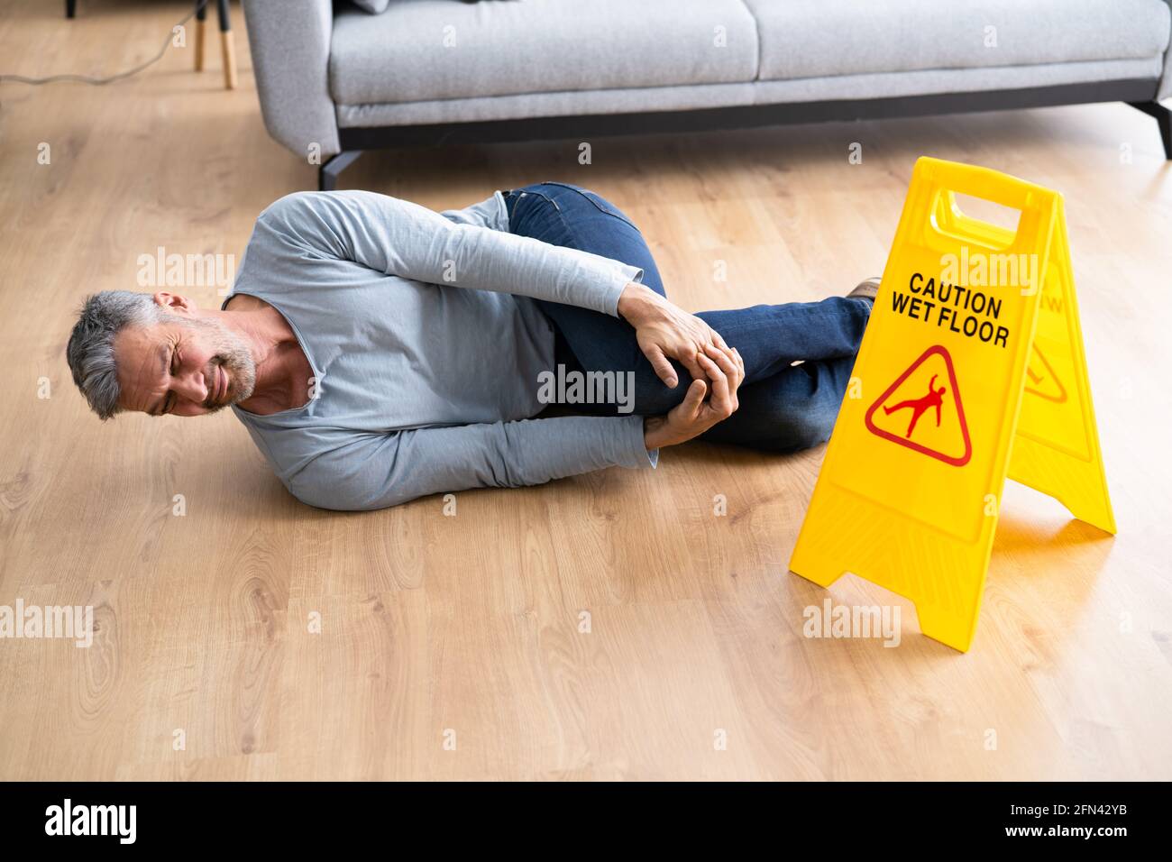 Slip Fall Accident. Floor Sign Caution And Safety Stock Photo - Alamy
