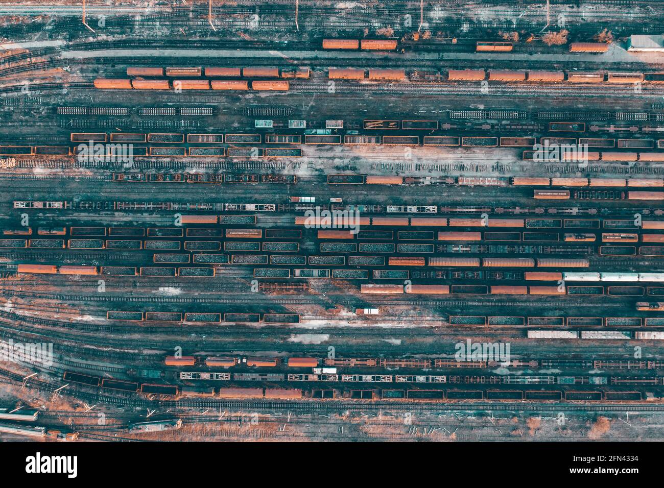 Aerial view of various railway carriage trains with goods on the ...