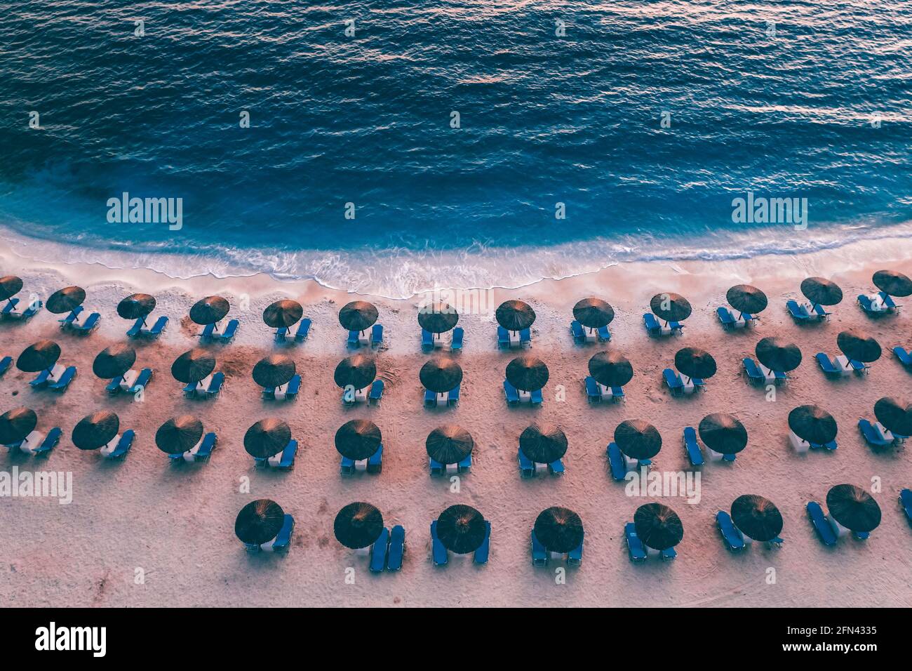 Aerial view of Marble beach. The most beautiful white beach in Greece ...