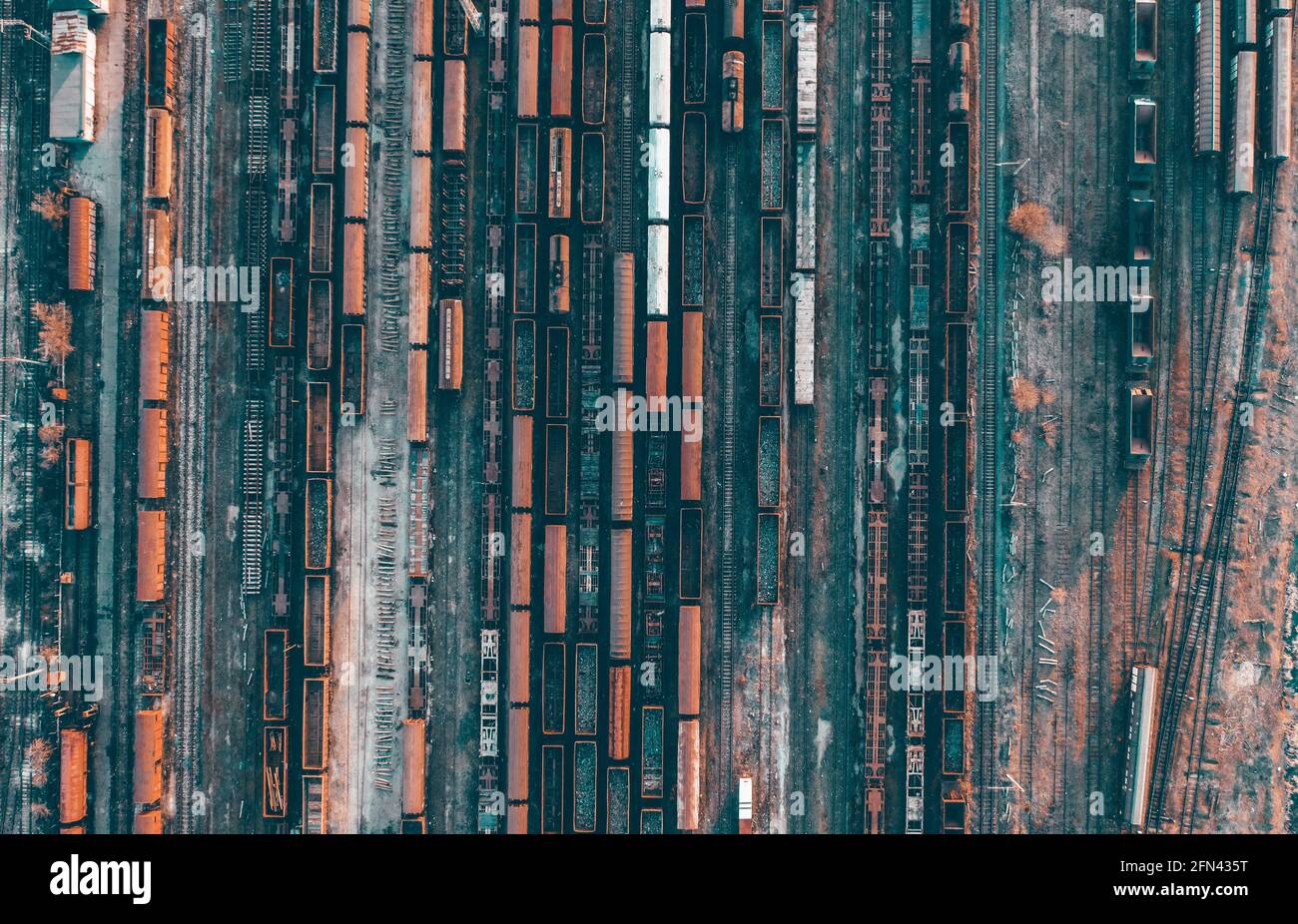 Aerial view of various railway carriage trains with goods on the ...