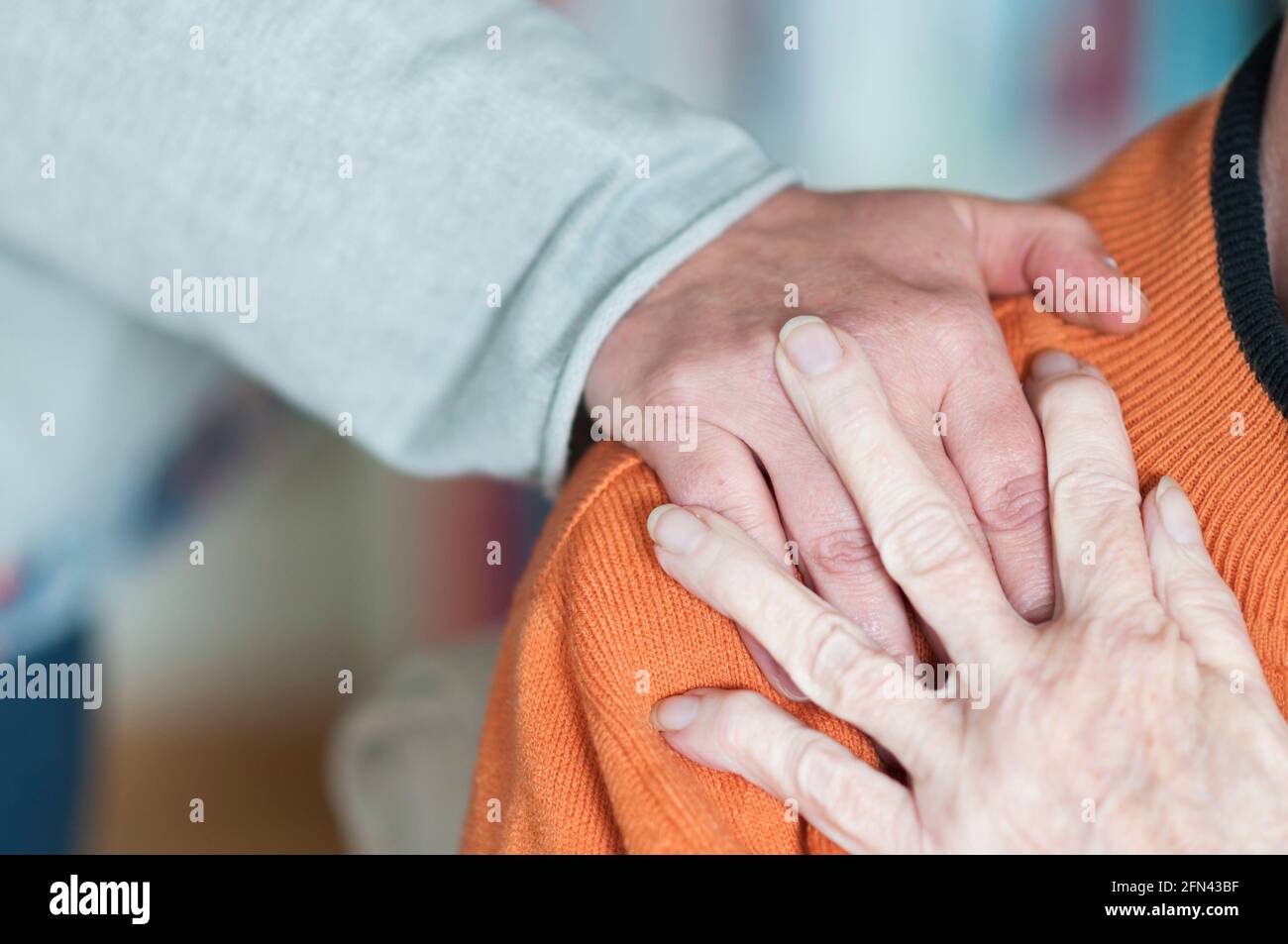 Compassion hand on shoulder hi-res stock photography and images - Alamy