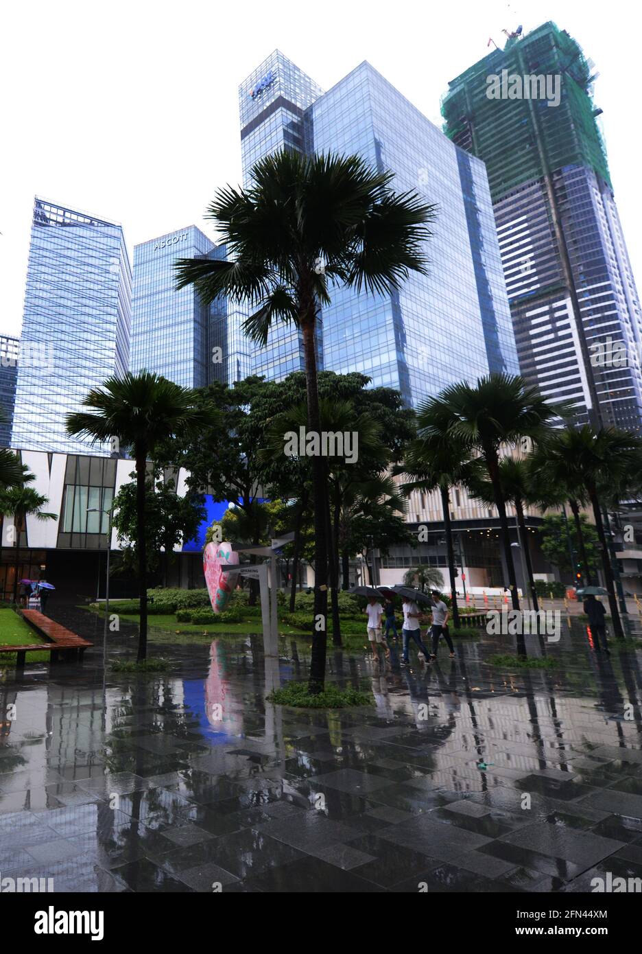 BGC park on High Street with modern buildings around it. Bonifacio ...