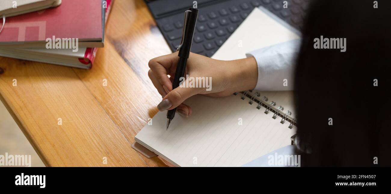 Overhead shot female writing hi-res stock photography and images - Alamy