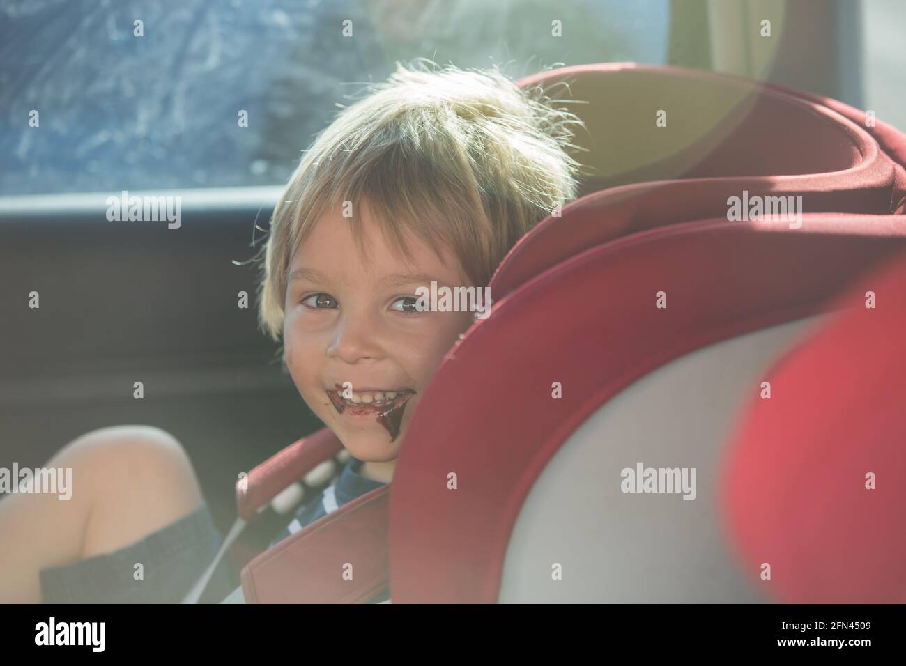 Sad boy inside car hi-res stock photography and images - Alamy
