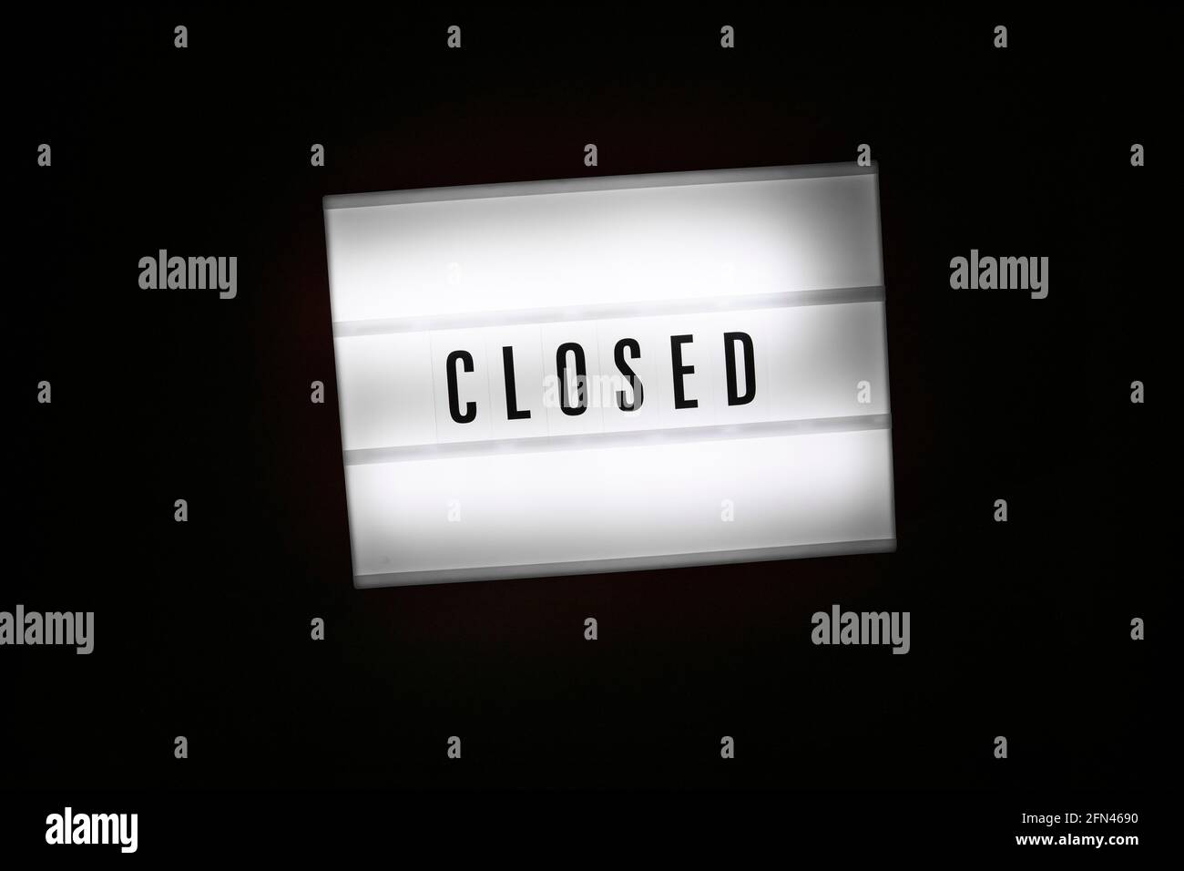 Lightbox with message CLOSED isolated on black background. Inscription ...
