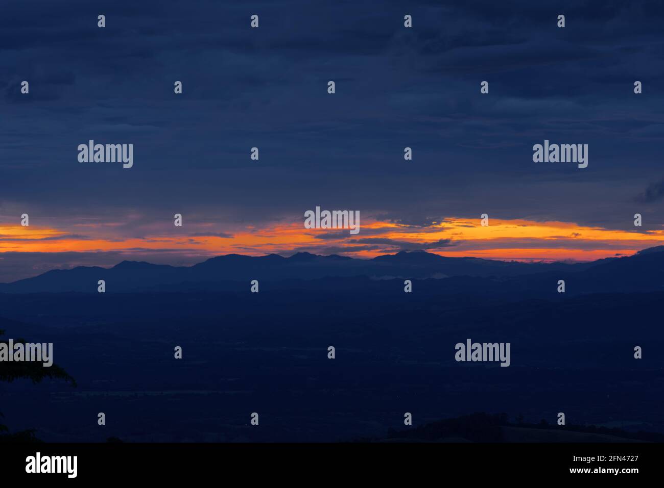 A view of gloomy sunset clouds and large mountain sky background cloudy ...