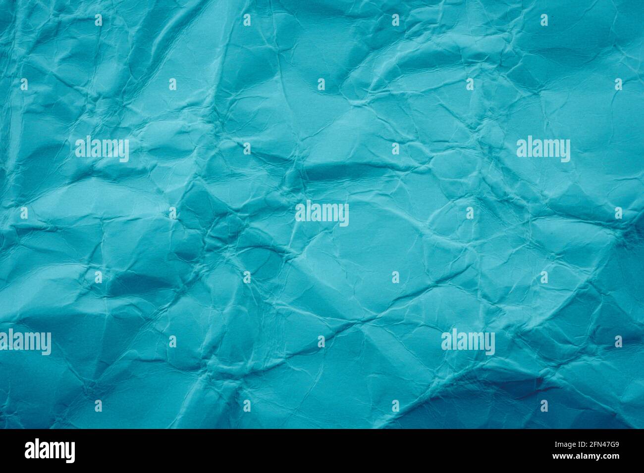 Blue crumpled paper background Stock Photo - Alamy