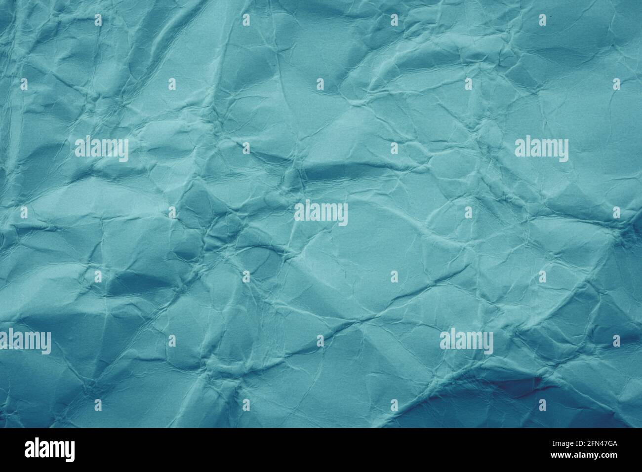 Blue crumpled paper background Stock Photo - Alamy