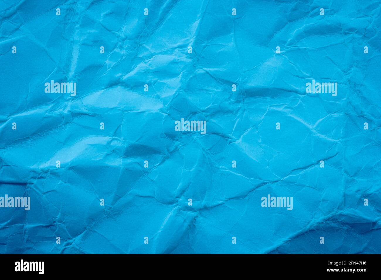 Blue crumpled paper background Stock Photo - Alamy