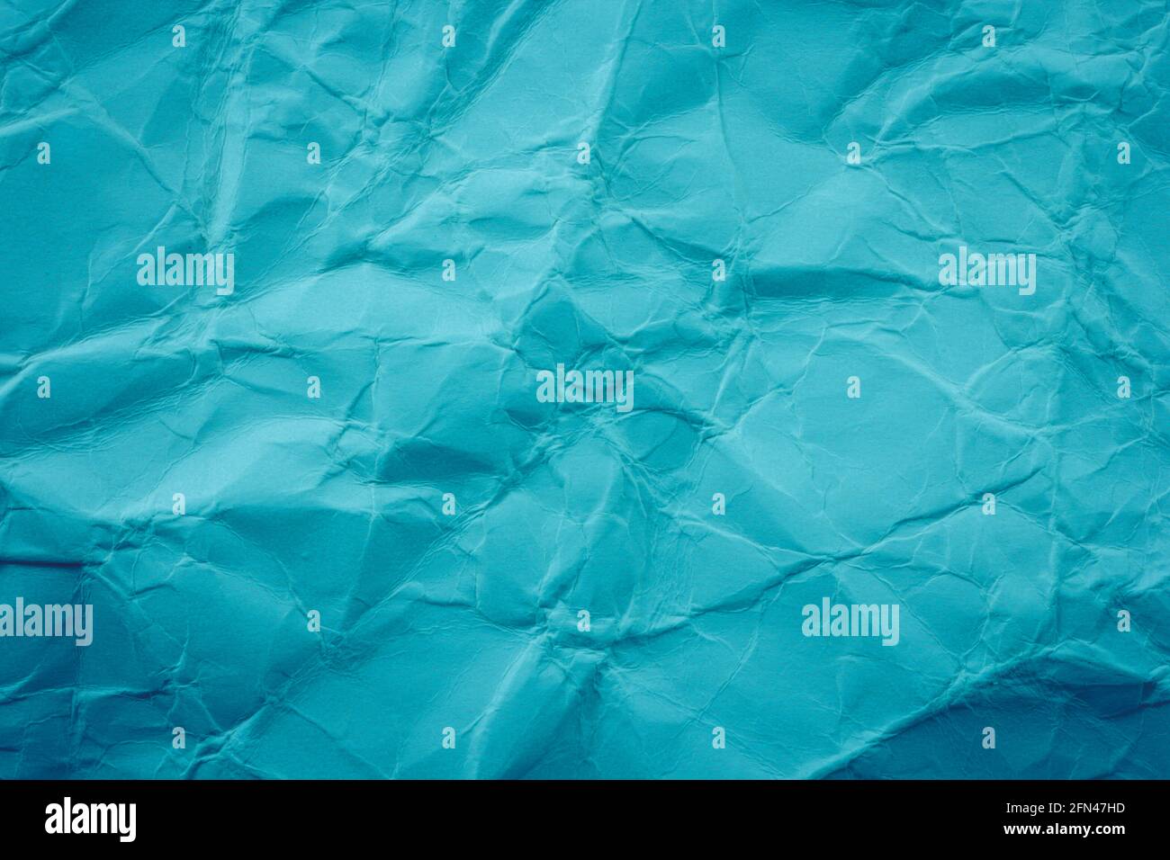 Blue crumpled paper background Stock Photo - Alamy