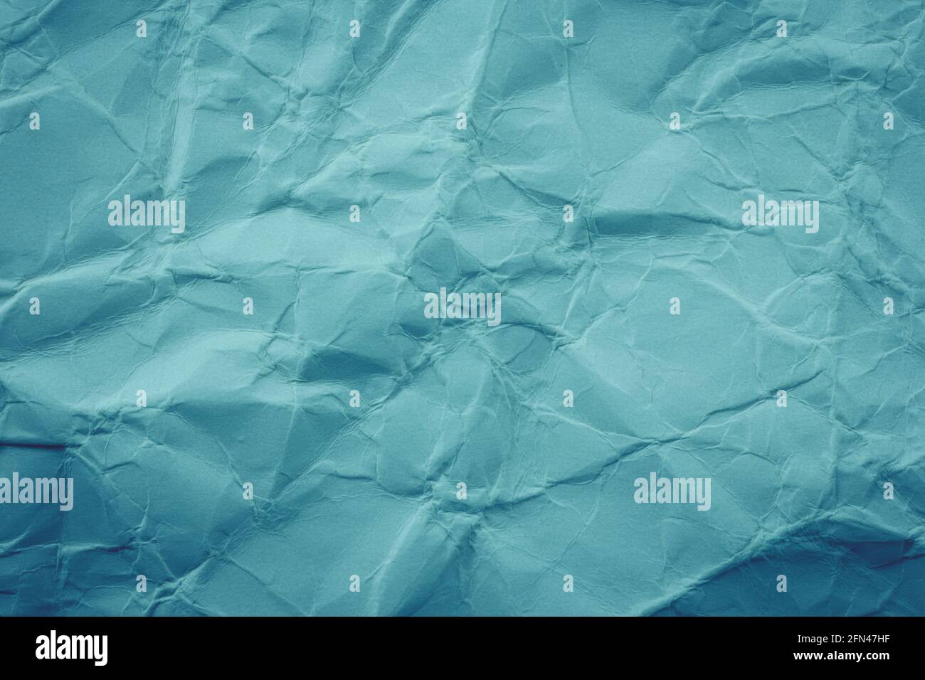 Blue crumpled paper background Stock Photo - Alamy