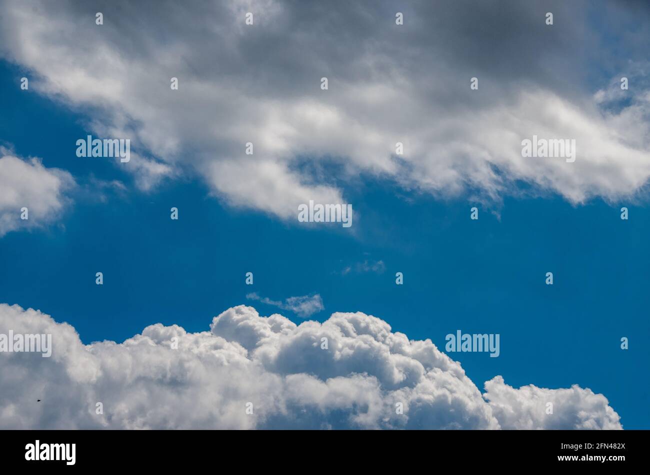 View into impressive spring sky with thick clouds as a texture or ...
