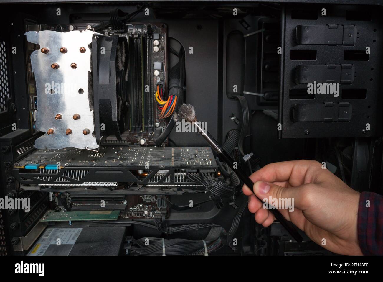 PC hardware cleaning engineer shows dust Stock Photo - Alamy