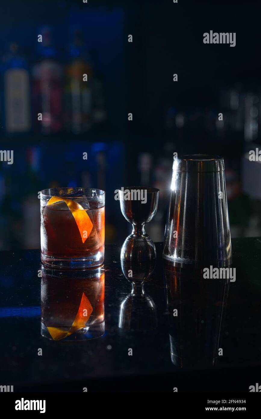 glass of cold fresh summer alcohol coctail on a table Stock Photo - Alamy