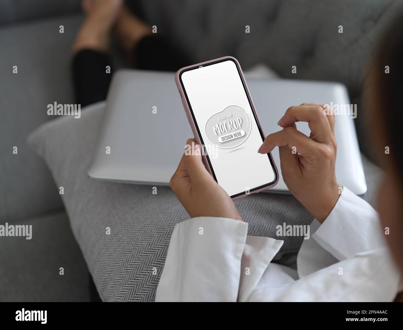 Close up view of female texting on mock up smartphone while relaxed ...