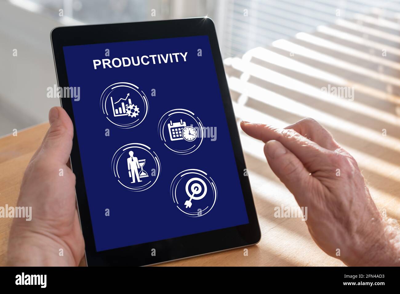 Tablet screen displaying a productivity concept Stock Photo - Alamy