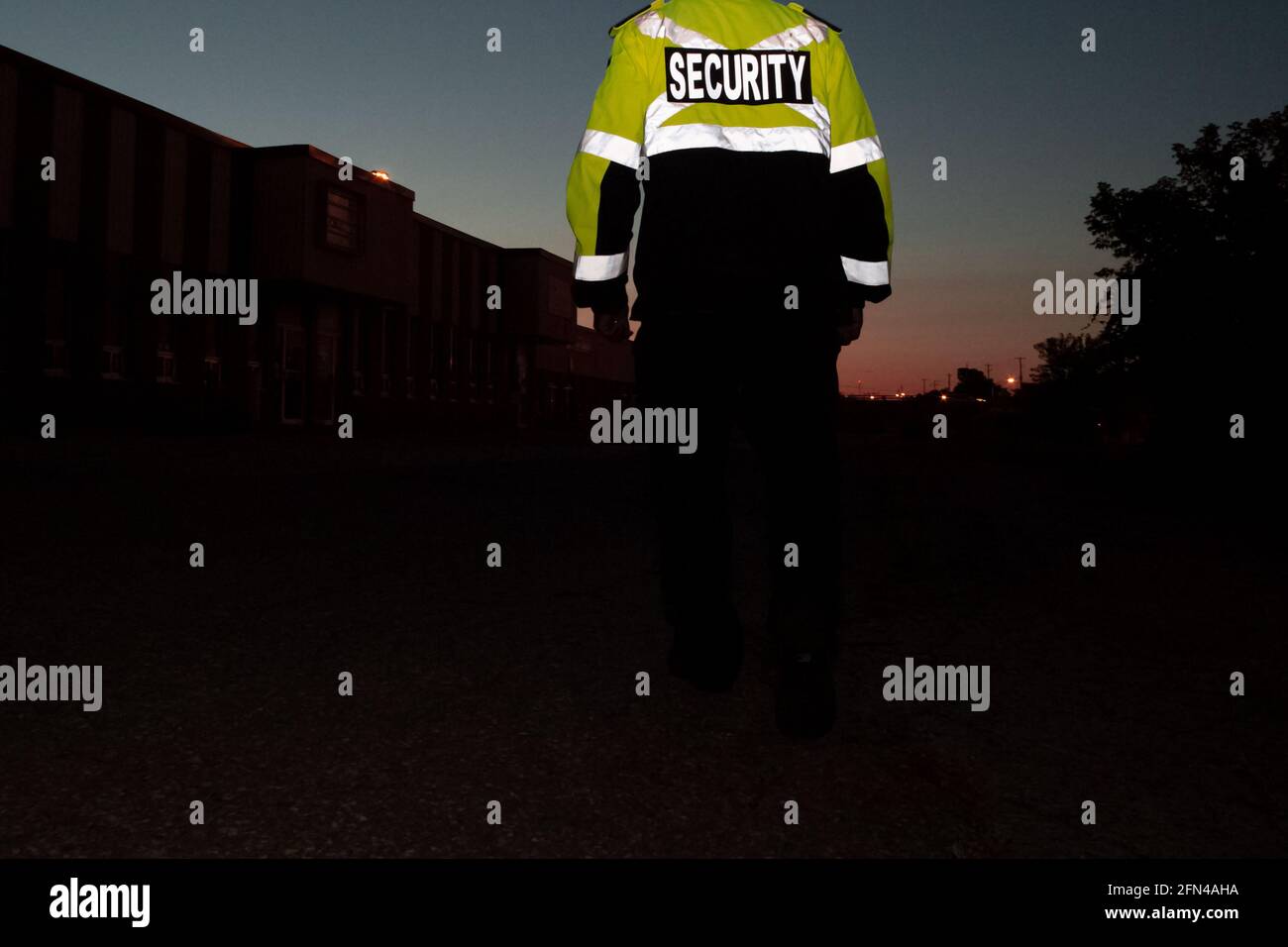 Security guard looking down street hi-res stock photography and images ...