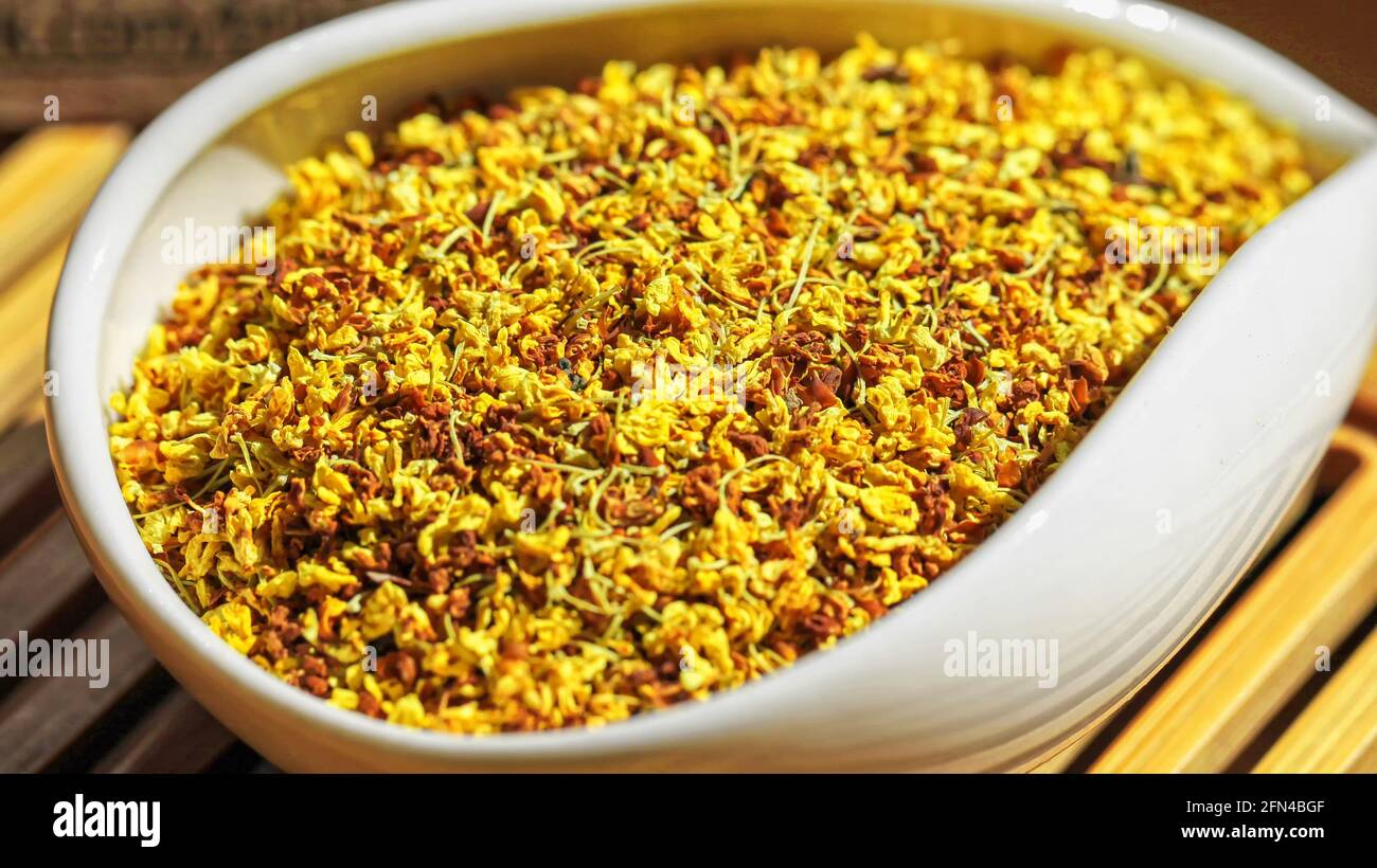 Bright, yellow osmanthus flowers for tea drinking in Tea presentation ...