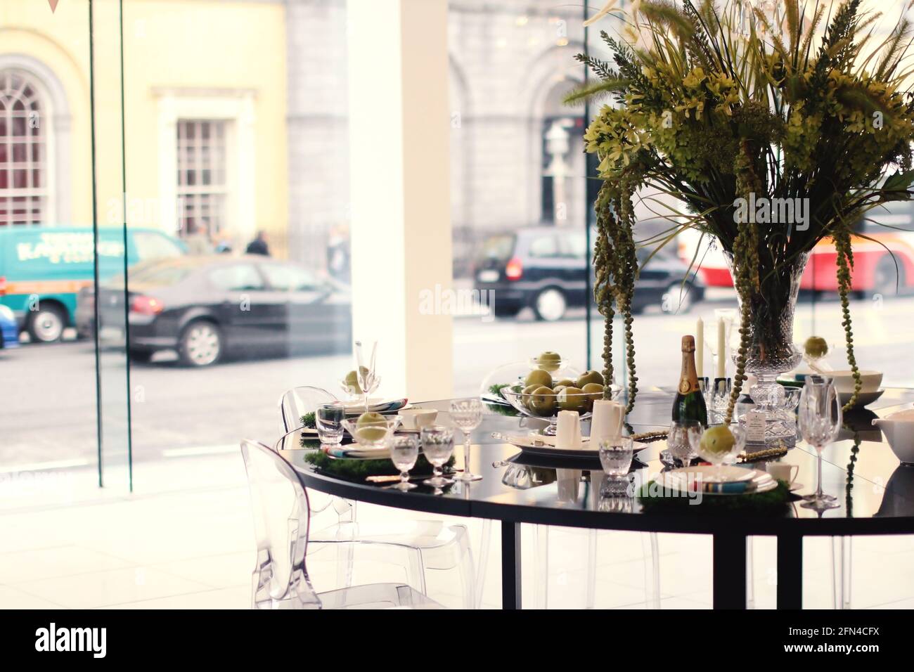 Table elegantly set for a showcase. Elegant lounge with a table set ...