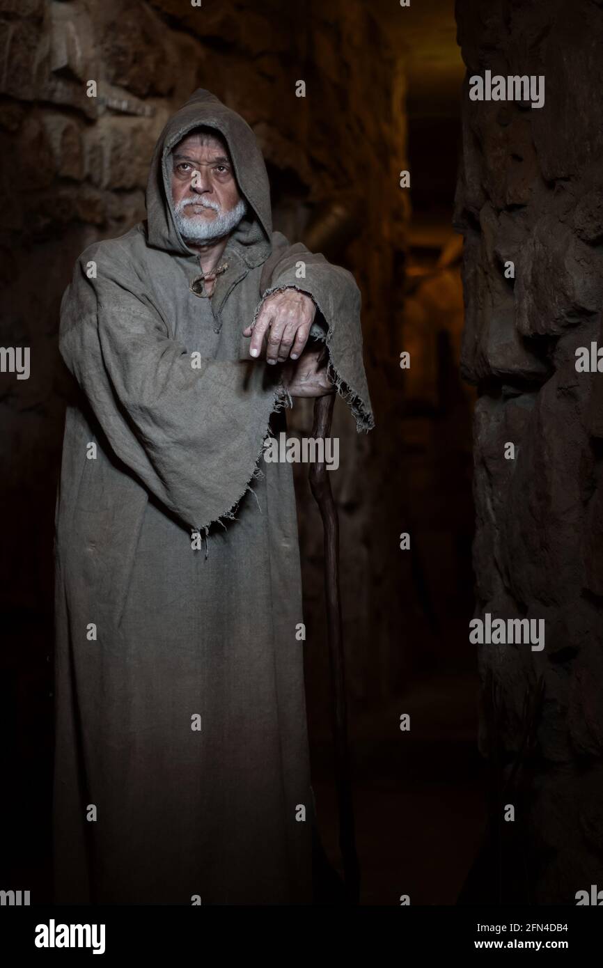 Medieval poor man walks in alleys Stock Photo - Alamy