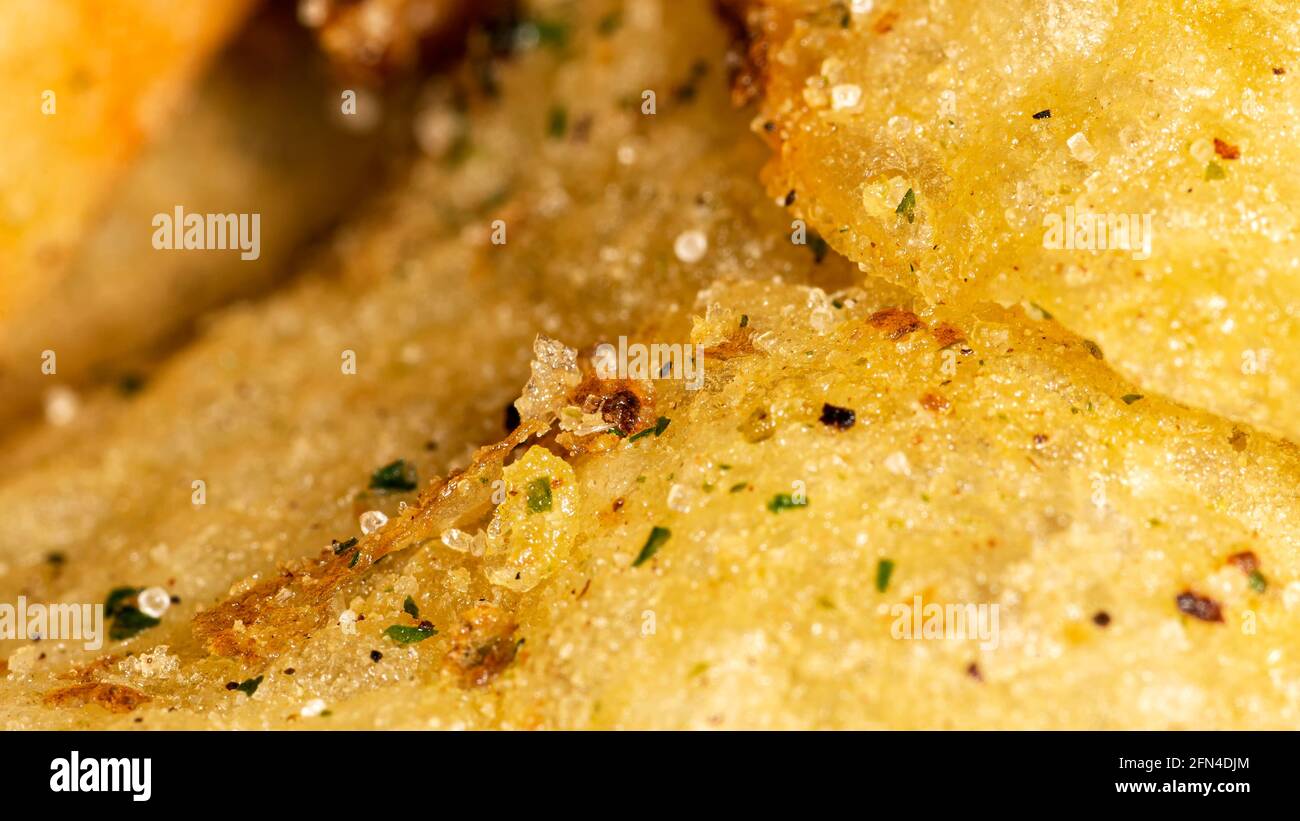 Natural fat potato chips with salt, black pepper, herbs and vegetable ...