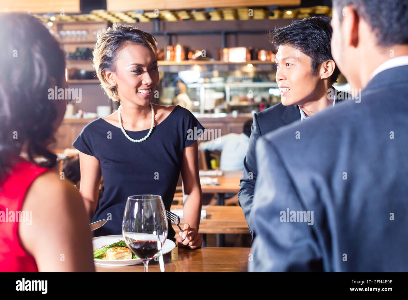Asian friends eating hi-res stock photography and images - Alamy