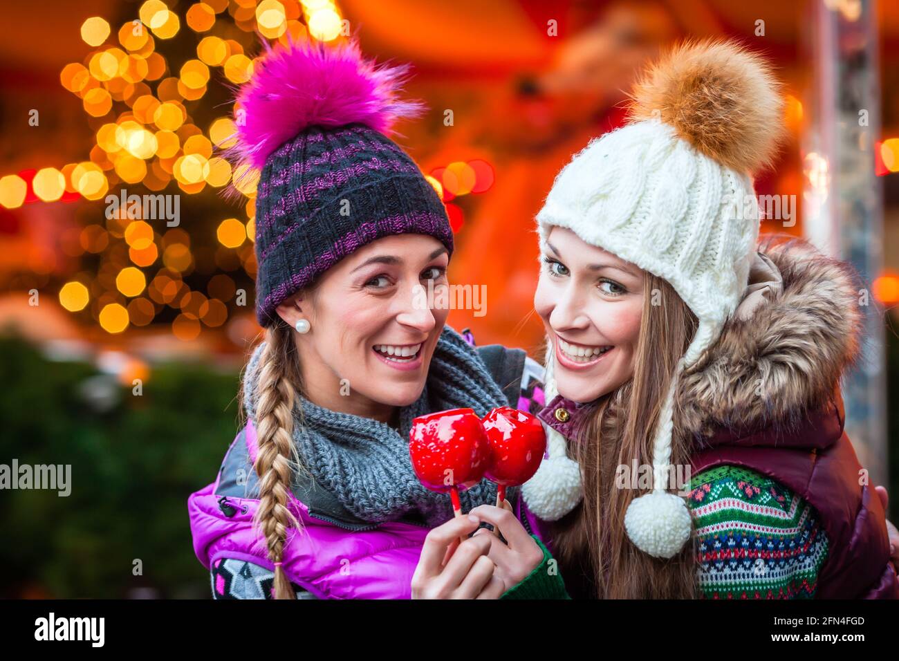 Woman candy apple outside hi-res stock photography and images - Alamy