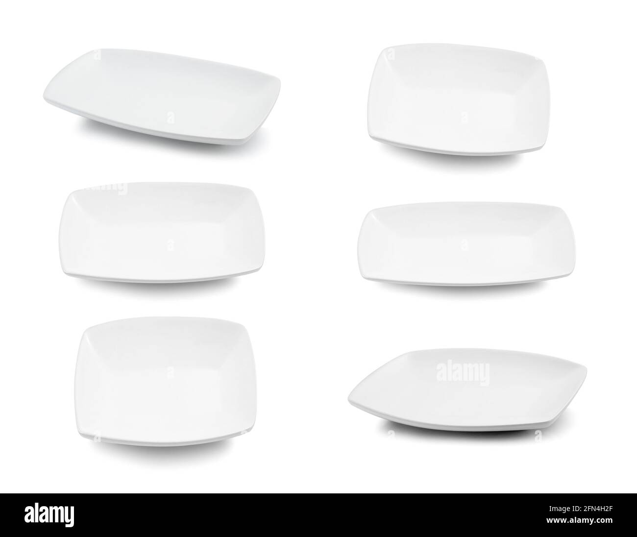 collection of ceramic white plate on white background Stock Photo - Alamy