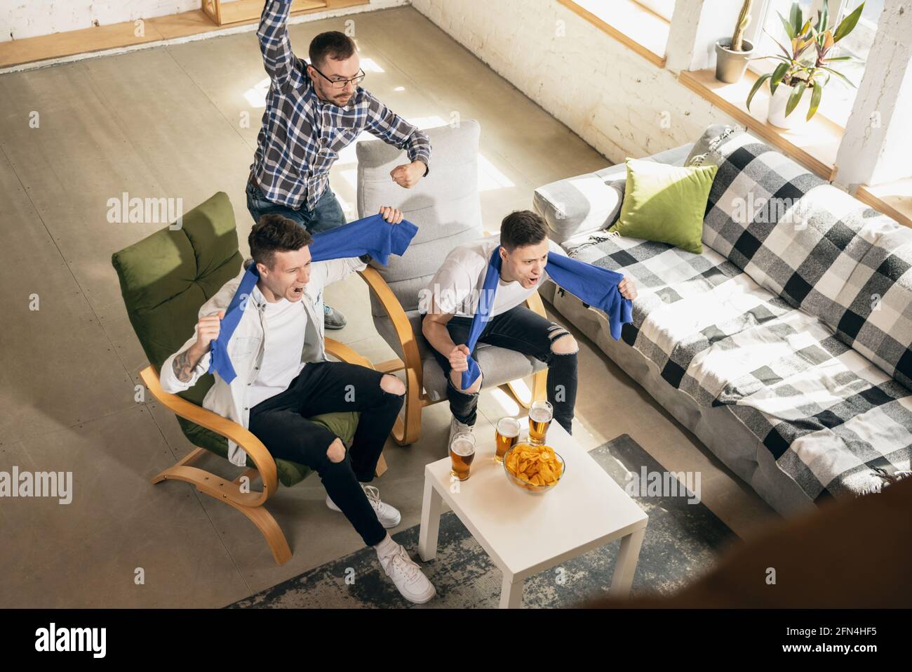 Group of friends watching sport match together. Concept of friendship ...