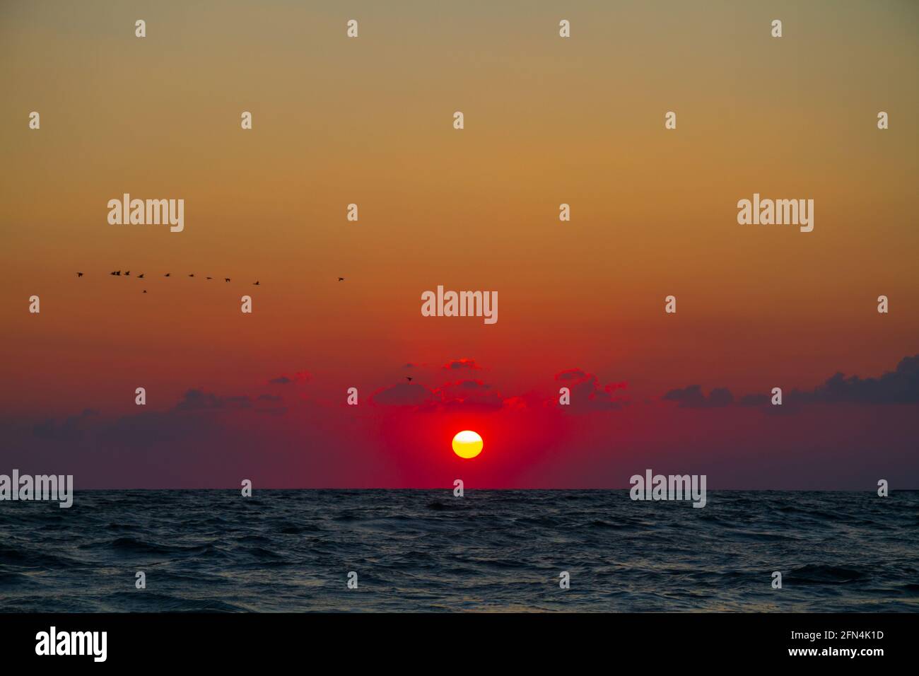 Bright colorful red sunrise in the Sea of Azov. Beautiful sky over the ...