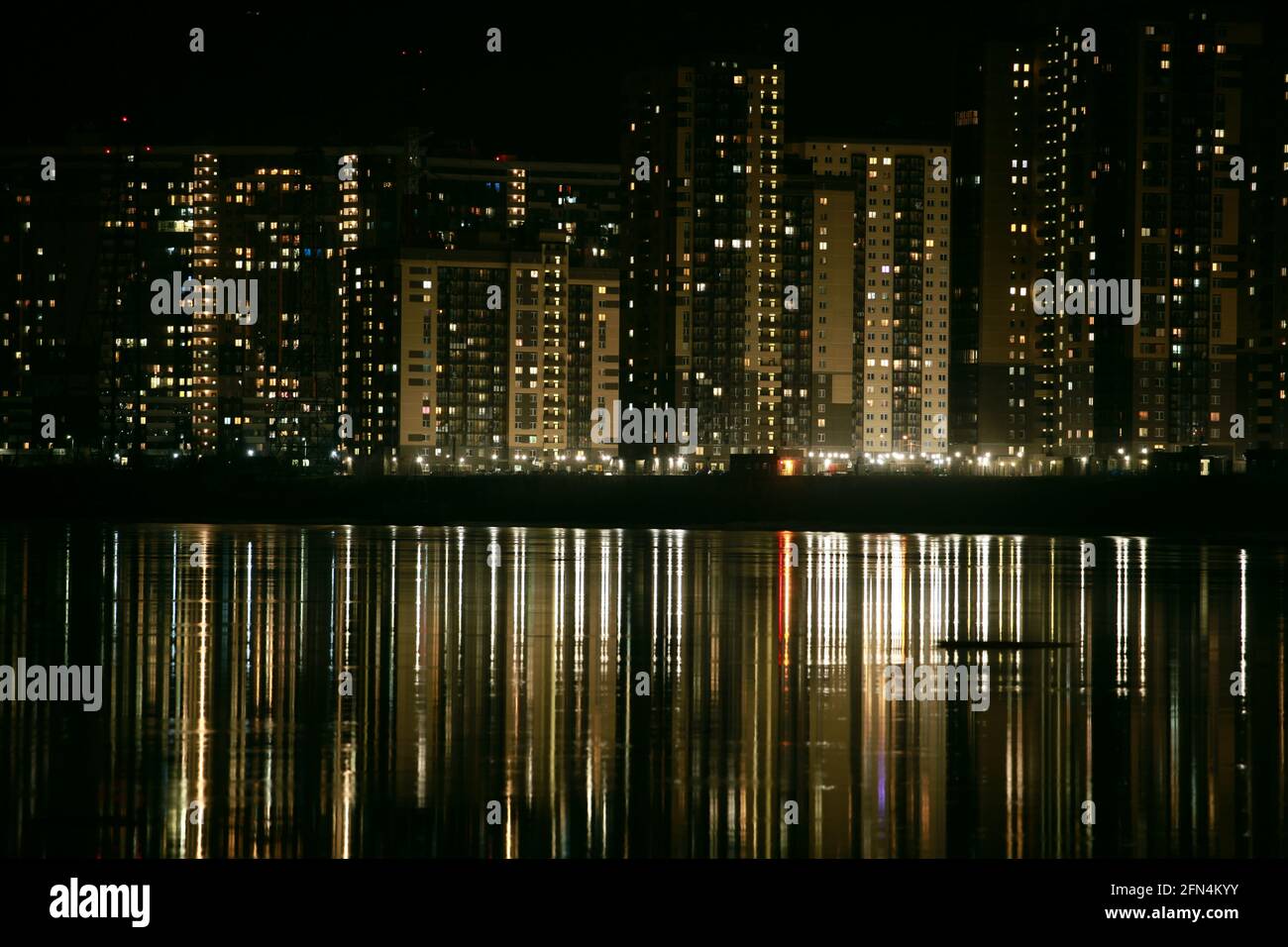 skyscrapers reflected in water at night panorama down up Stock Photo ...