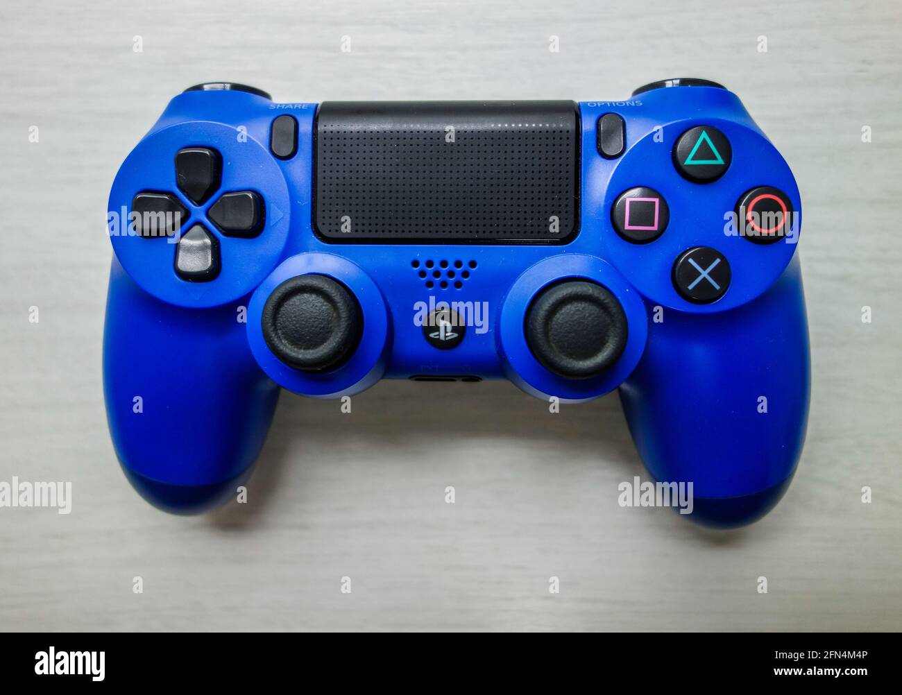 SAO PAULO, BRAZIL - May 04, 2021: Dualshock 4 blue controller for Sony ...