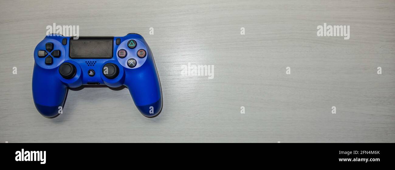 SAO PAULO, BRAZIL - May 04, 2021: Dualshock 4 blue controller for Sony ...