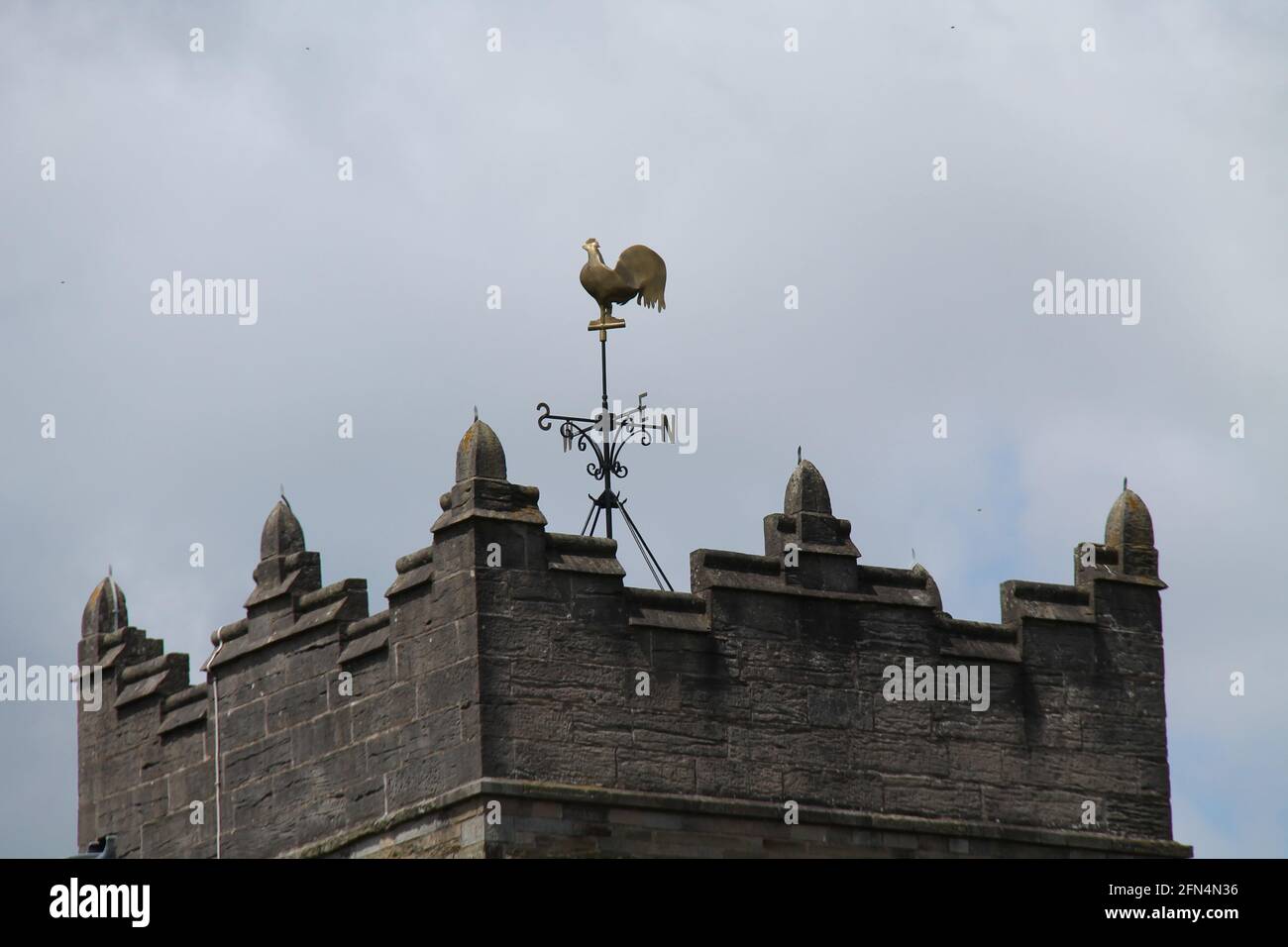 A Cockerel Designed Wind Vane on a Church Tower Stock Photo - Alamy
