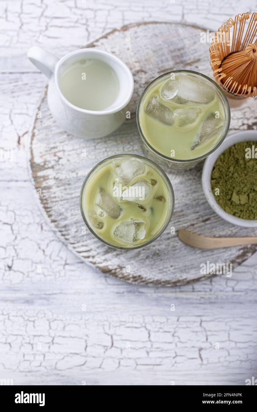 Cold matcha tea with milk and ice Stock Photo - Alamy
