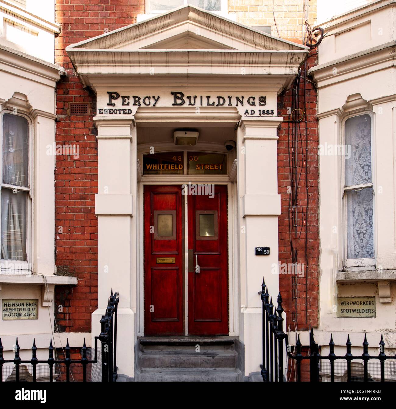 Decorative front door/entrance to Percy Buildings, 49-50 Whitfield St ...
