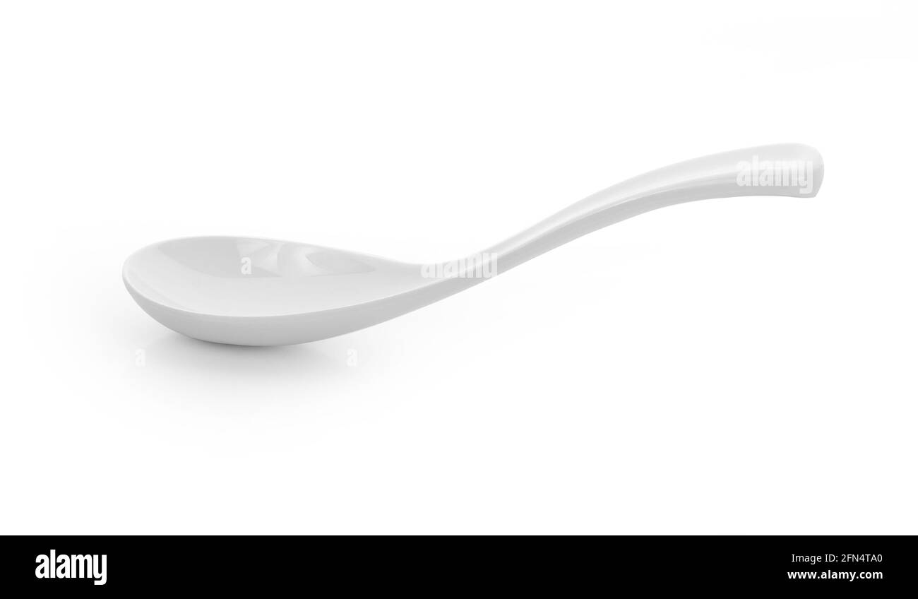 empty spoon on white background Stock Photo - Alamy