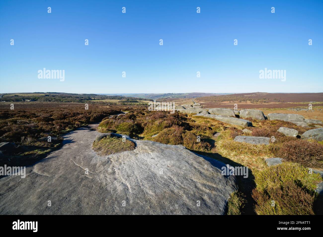 From a large weathered slab of gritstone high on Burbage Edge South to ...